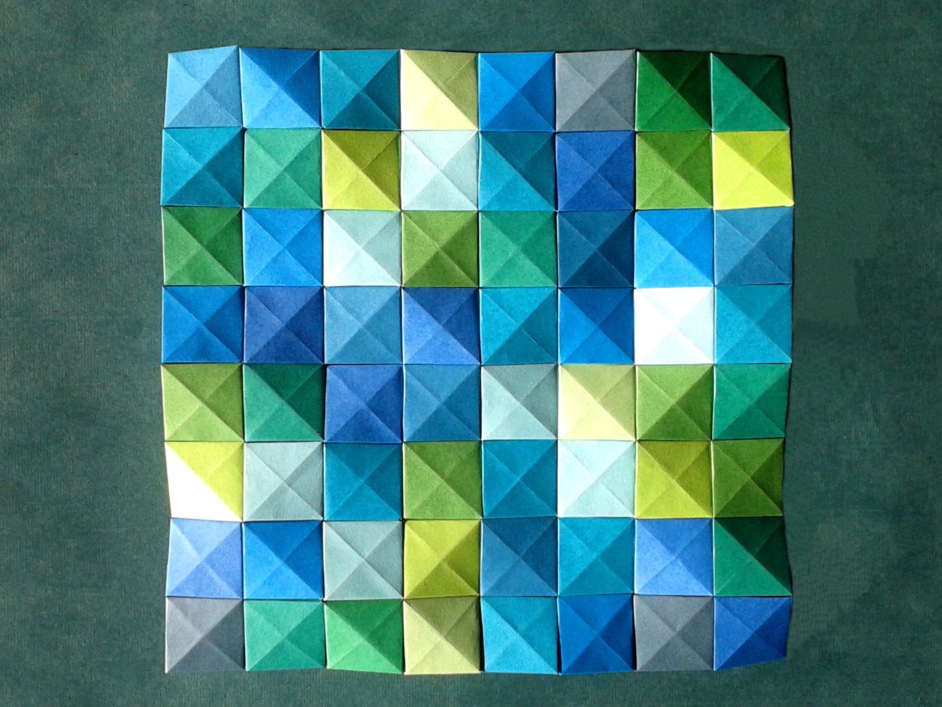 Origami mosaics with origami pixels