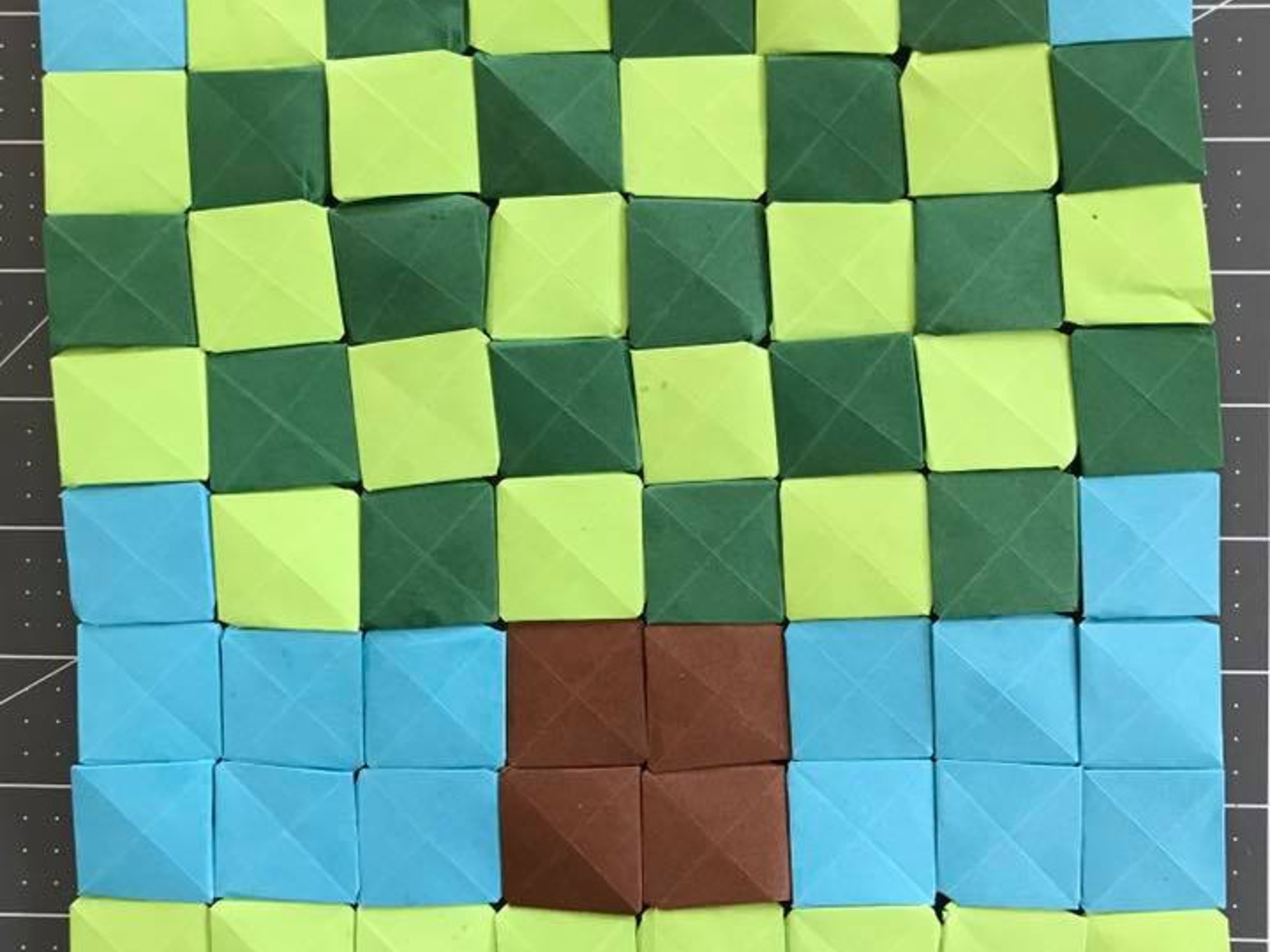 Origami mosaics with origami pixels