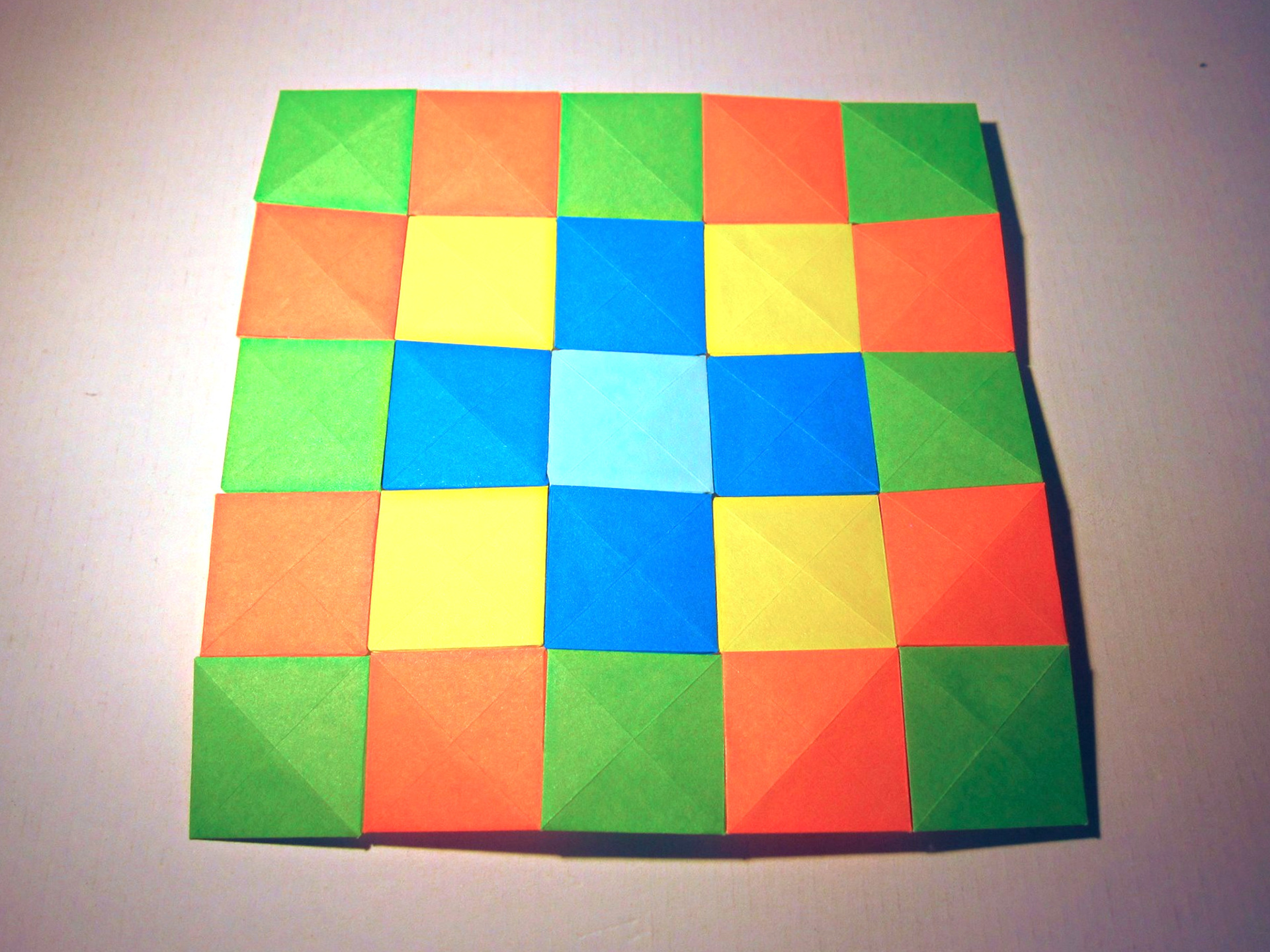 Origami mosaics with origami pixels